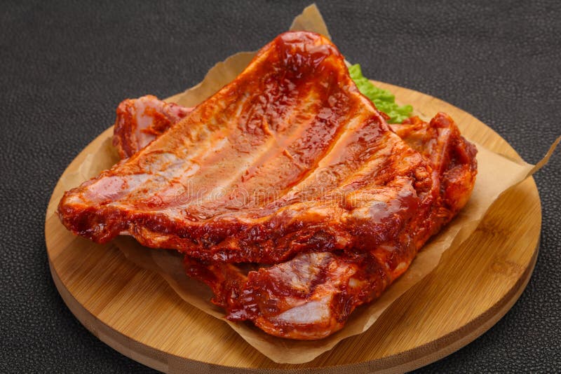 Raw marinated pork ribs stock image. Image of spareribs - 154420091