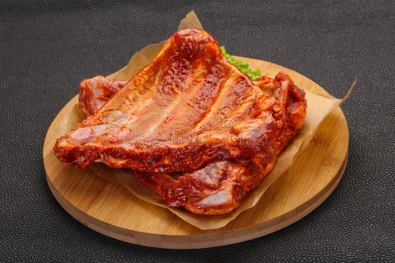 Raw marinated pork ribs stock photo. Image of chop, muscle - 184230618