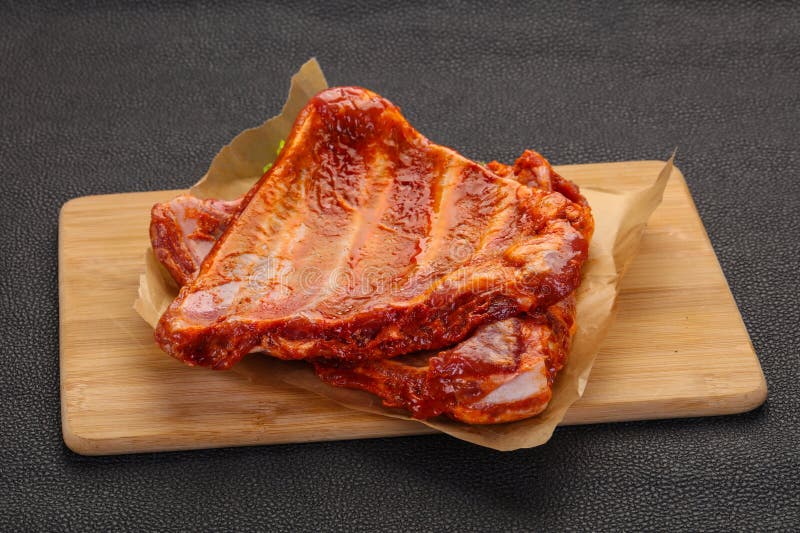 Raw marinated pork ribs stock photo. Image of tasty - 181797398