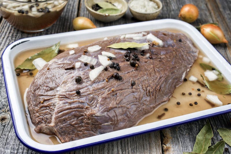 Raw Marinated Traditional German Sauerbraten from Beef with Vegetable ...