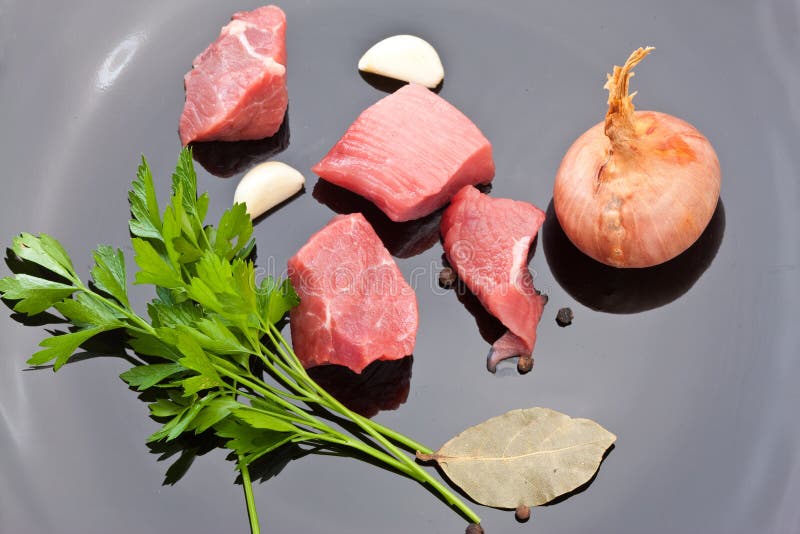 Raw meat stock image. Image of parsley, white, beef, garlic - 18385835