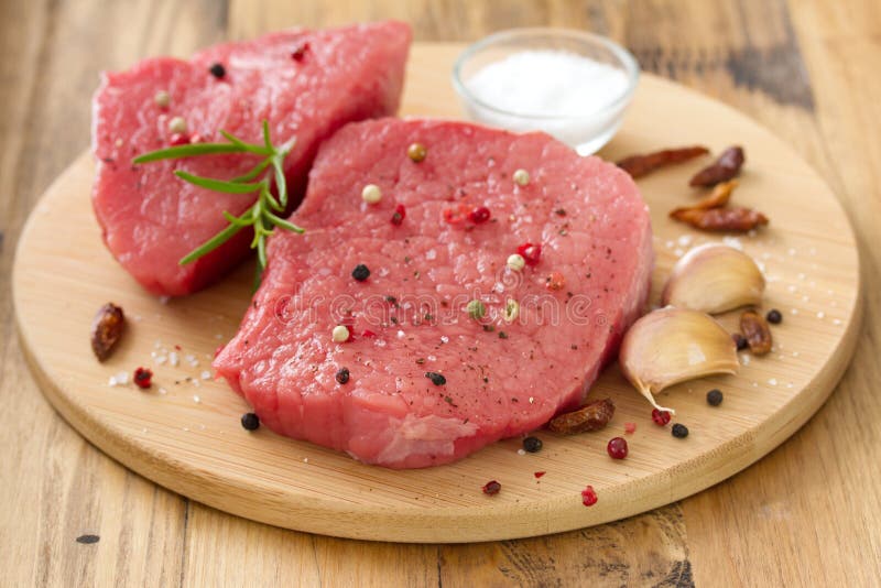 Raw Meat with Black and Pink Pepper, Garlic Stock Photo - Image of ...
