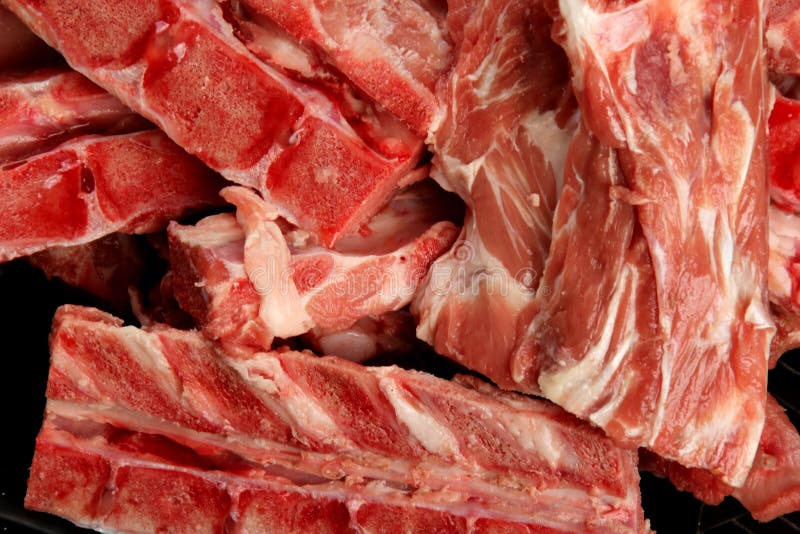 Raw Meat with Bone on Clay Plate and Luxury Marble Background. Raw Meat ...