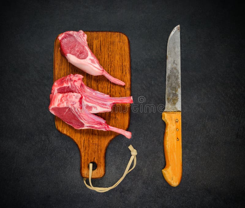 Raw Meat with Butcher Knife Stock Image - Image of background, chops ...