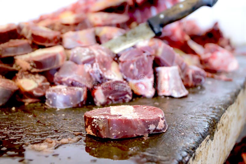 Raw meat in a butchery stock photo. Image of steak, knife - 186217966