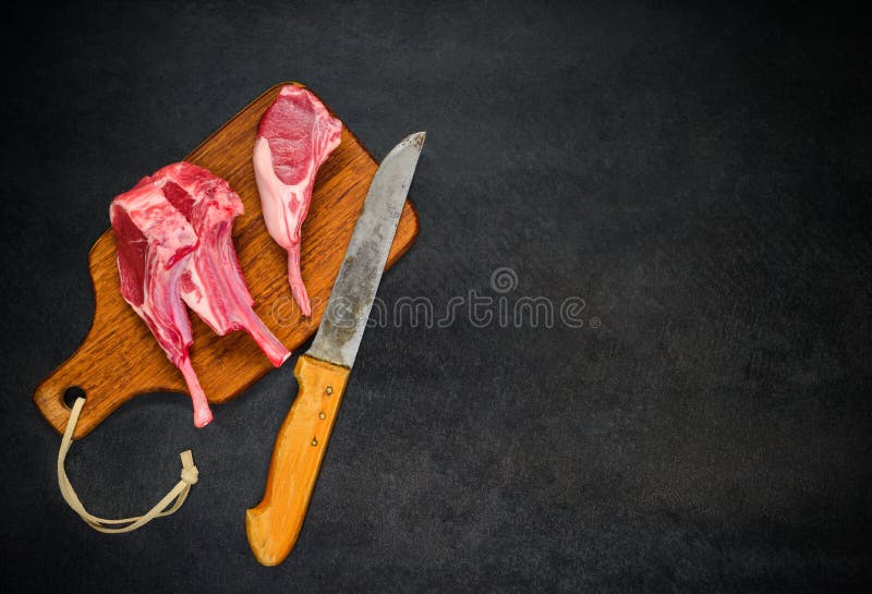 Raw Meat Chops with Butcher Knife and Copy Space Stock Photo - Image of ...