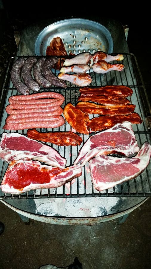 Raw Meat on a Fire To Be Cooked Stock Image - Image of fire, chicken ...