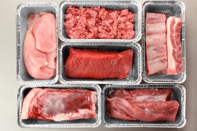 Raw Meat in Foil Containers on Light Background Stock Image - Image of ...