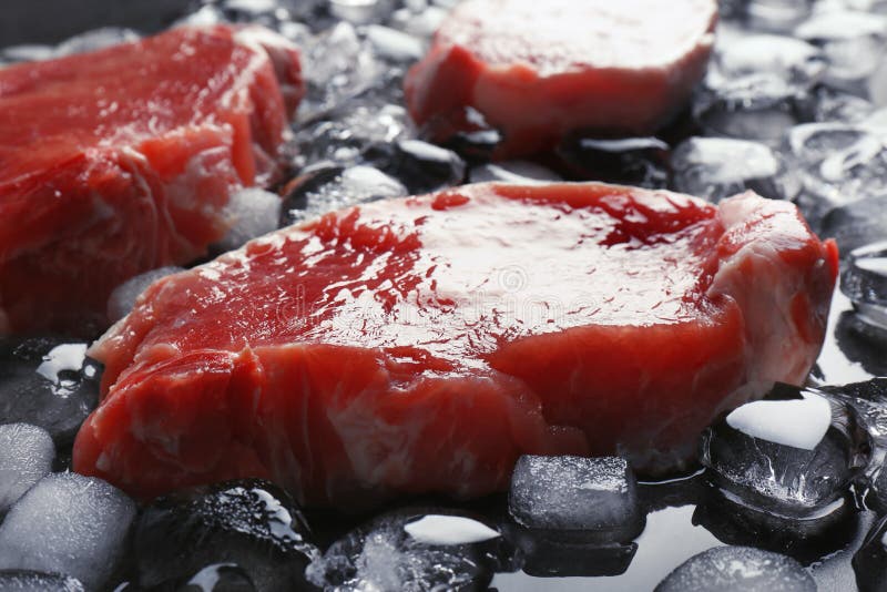 Raw meat and ice cubes stock image. Image of crystal - 140211121