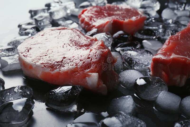 Raw meat and ice cubes stock photo. Image of fresh, clear - 140400540