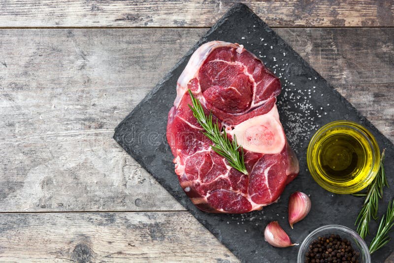 Raw Meat and Ingredients on Black Slate Stock Photo - Image of ...