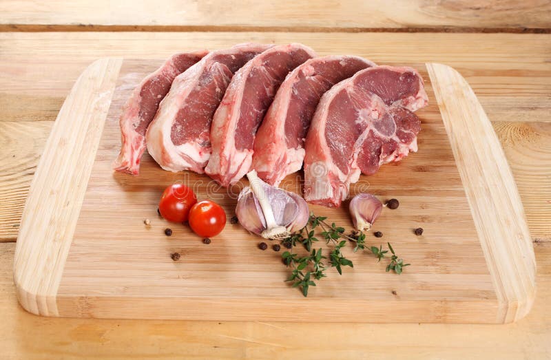 Raw Meat Lamb Entrecote on Bone on a Wooden Board Stock Image - Image ...