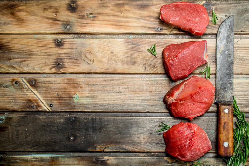 Raw Meat. Pieces of Fresh Beef with an Old Hatchet Stock Image - Image ...