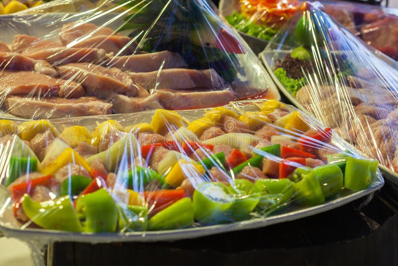 Raw meat in plastic wraps stock image. Image of hotel - 118850483