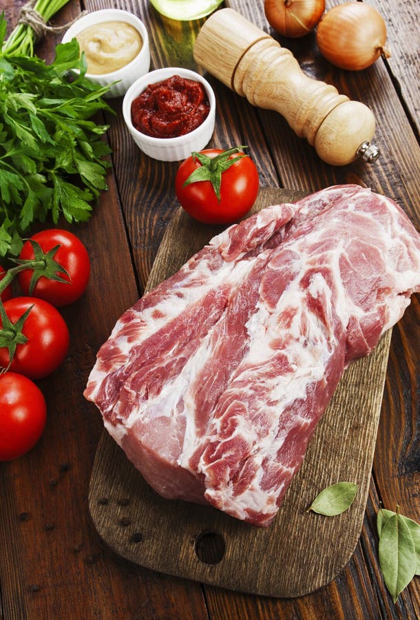 Raw meat pork stock image. Image of table, parsley, pork - 153989343