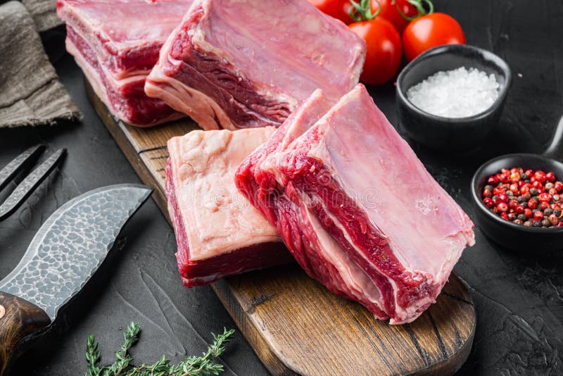 Raw Meat Ribs, with Ingredients , on Black Stone Background Stock Photo ...