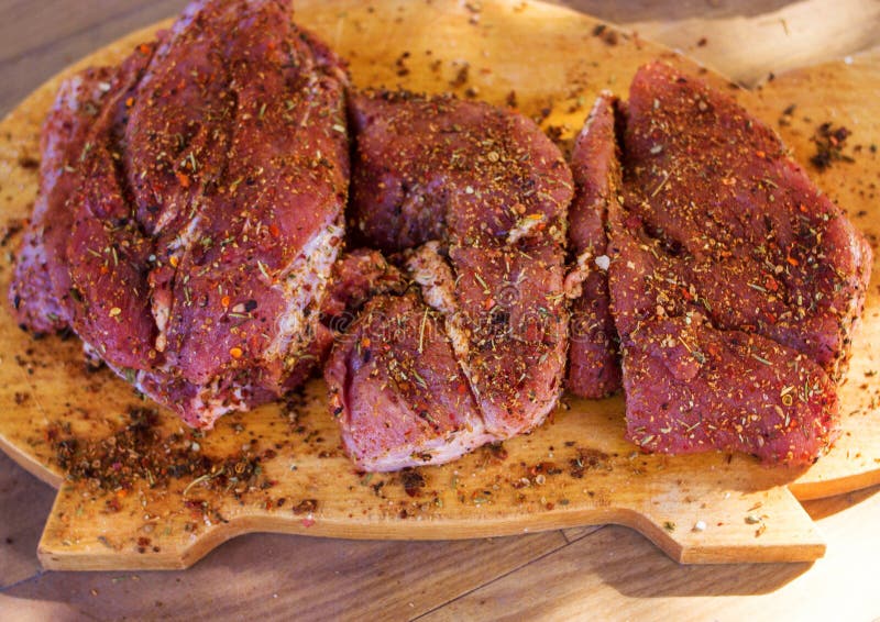 Raw Meat with Seasoning on the Tree Stock Photo - Image of chop, food ...