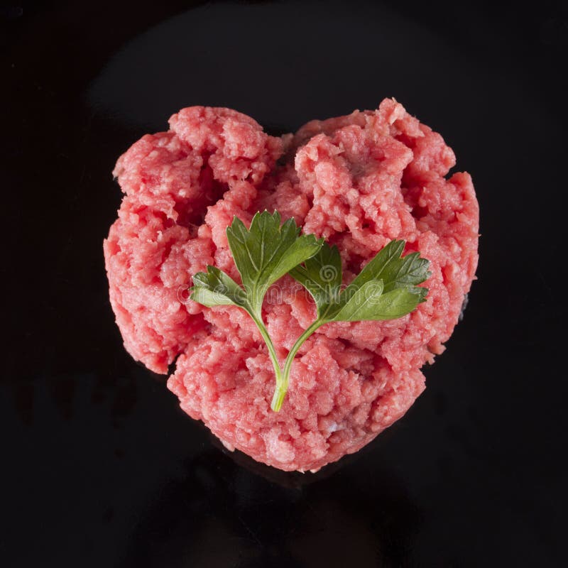 Raw meat in shape of heart stock image. Image of shape - 76598047