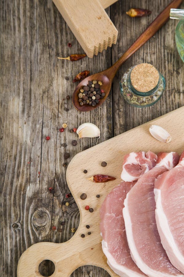 Raw Meat with Spices on a Table Stock Photo - Image of animal, gourmet ...
