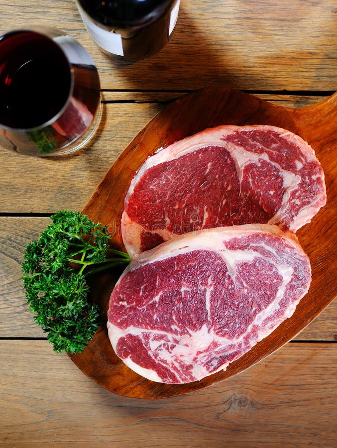 Raw meat with wine stock photo. Image of chop, dinner - 24650082
