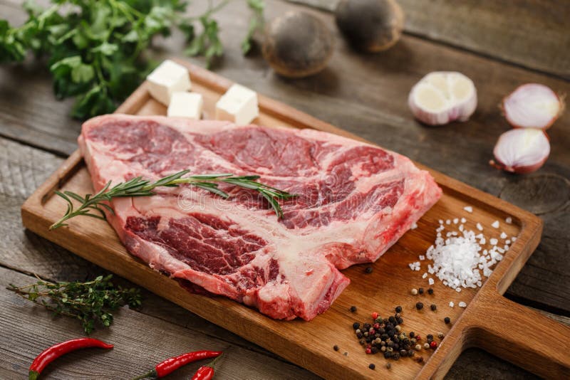 Raw meat on the wood stock photo. Image of mignon, leaf - 90613698