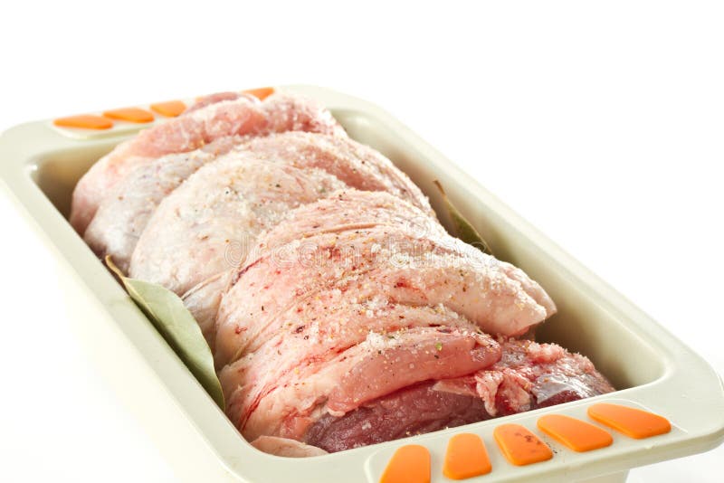 Raw meat wrapped in a roll stock image. Image of pork - 24370373