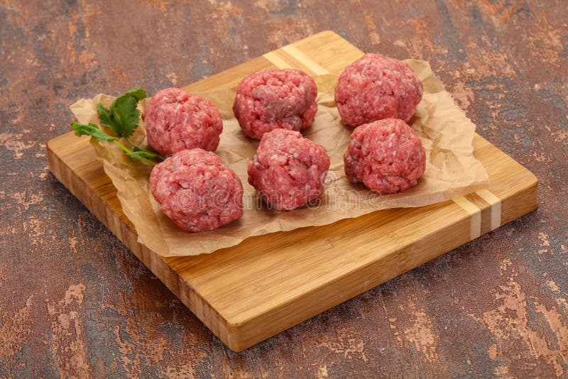 Raw Meatball Over Wooden Background Stock Photo - Image of cook, heap ...