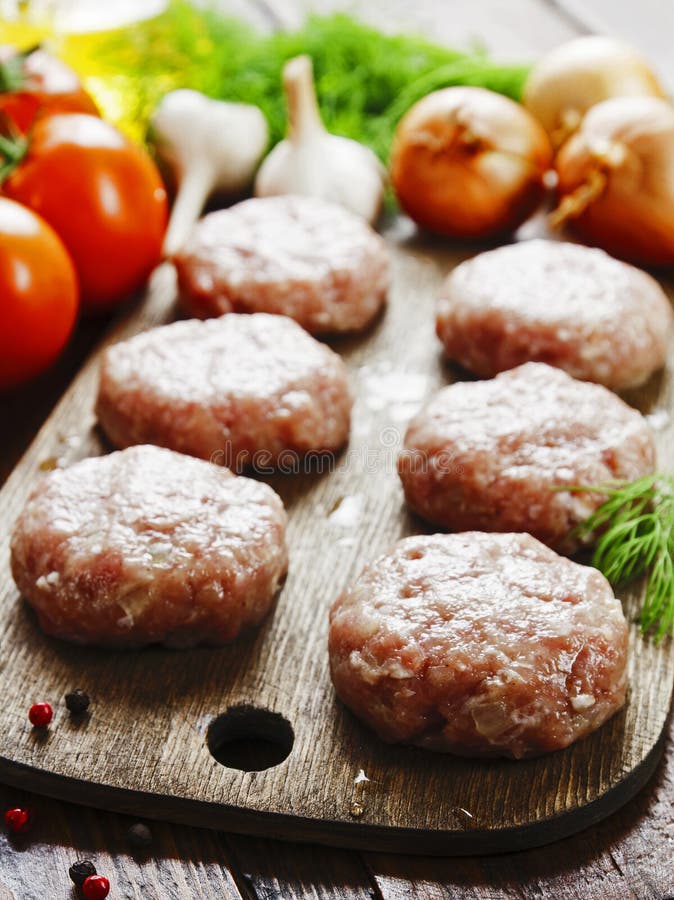 Raw meatballs on the table stock photo. Image of cooked - 177148192
