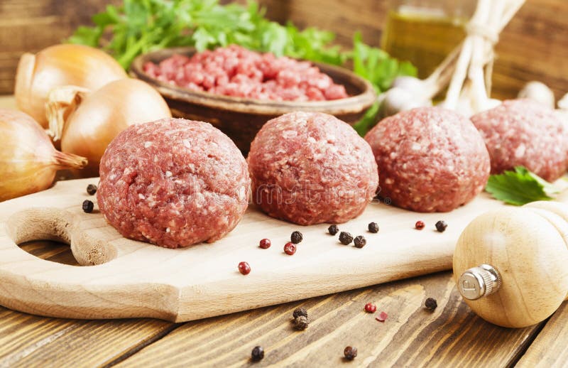 Raw meatballs on the table stock image. Image of lunch - 68957795