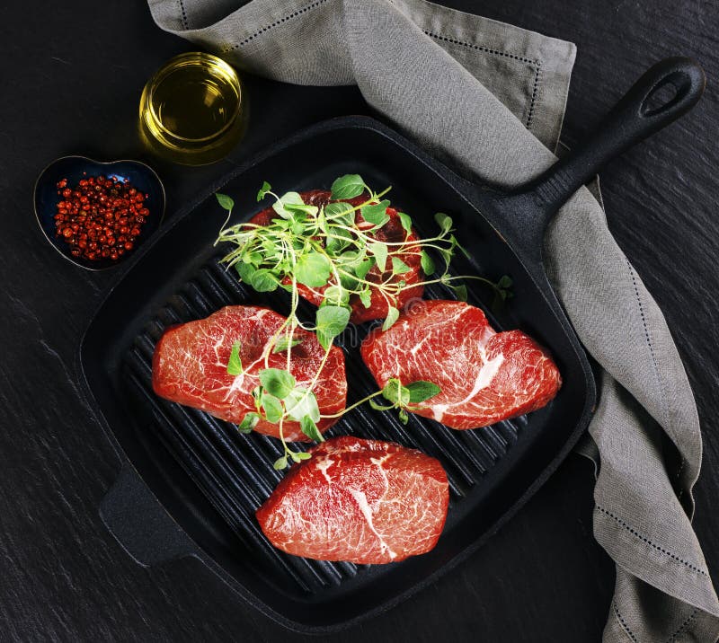 Raw Meet in Cast Iron Grill Pan Stock Photo - Image of steak, dark ...