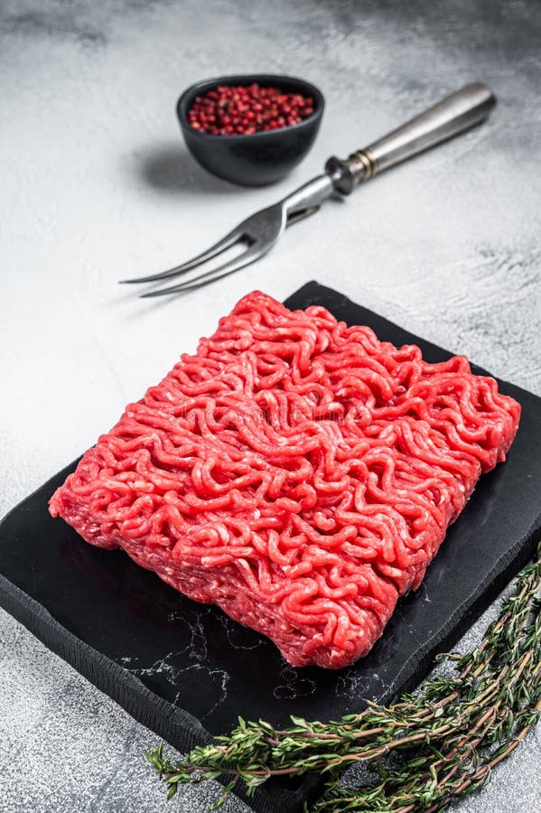 Raw Mince Minced Beef, Ground Meat with Thyme and Pepper. White ...