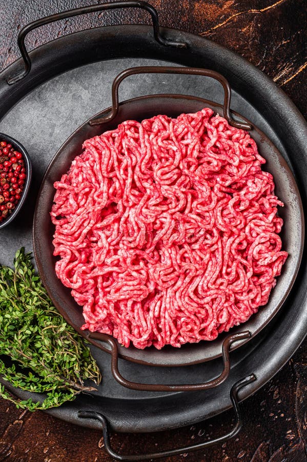 Raw Mince, Minced Ground Beef Meat in a Kitchen Tray. Dark Background ...
