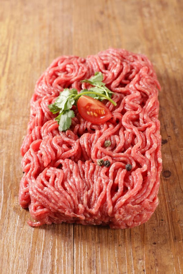 Raw minced beef with herb stock image. Image of minced - 165632335