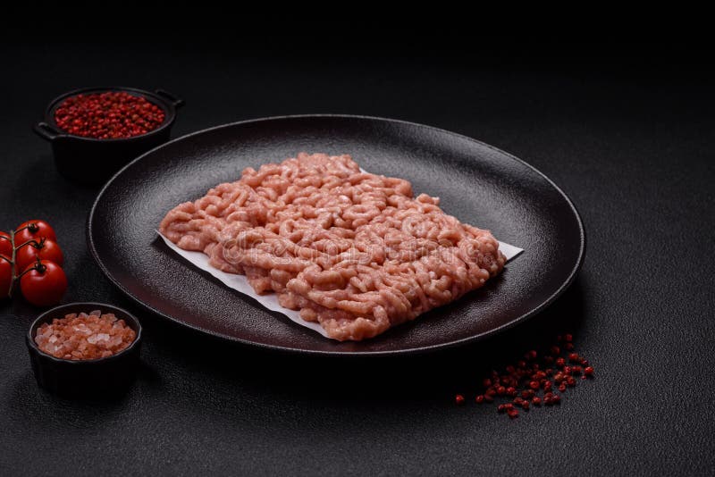 Raw Minced Chicken with Salt, Spices and Herbs Stock Photo - Image of ...