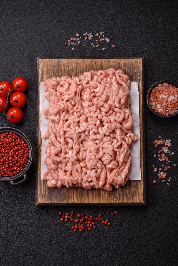 Raw Minced Chicken with Salt, Spices and Herbs Stock Photo - Image of ...