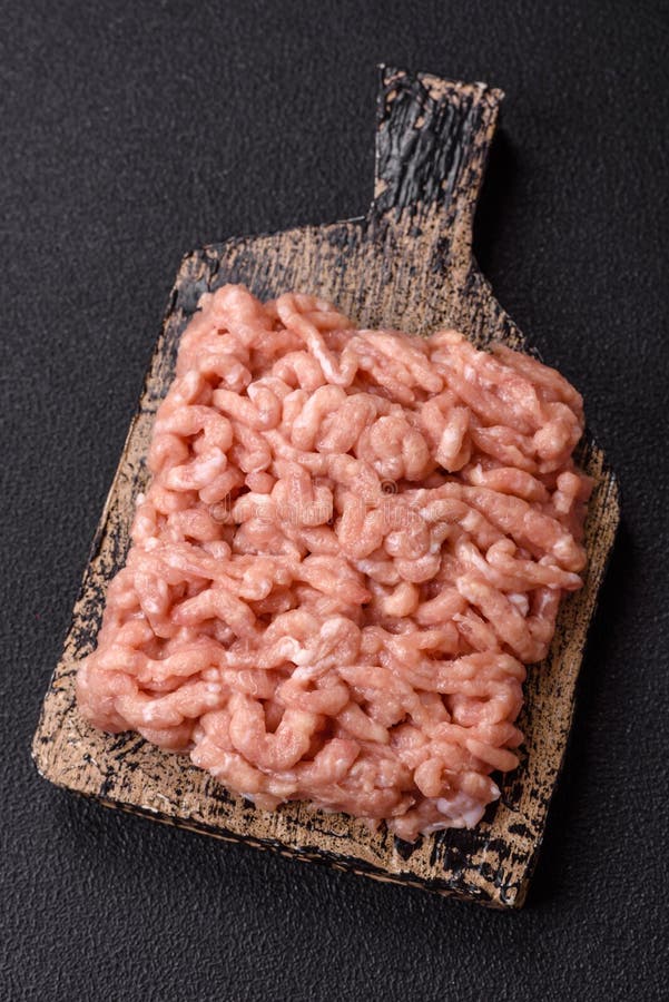 Raw Minced Chicken with Salt, Spices and Herbs Stock Photo - Image of ...