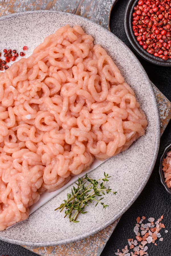 Raw Minced Chicken with Salt, Spices and Herbs Stock Photo - Image of ...