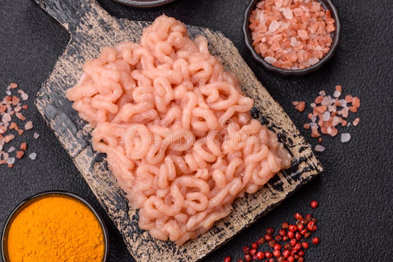 Raw Minced Chicken with Salt, Spices and Herbs Stock Photo - Image of ...