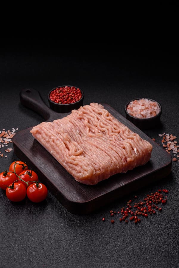 Raw Minced Chicken with Salt, Spices and Herbs Stock Photo - Image of ...