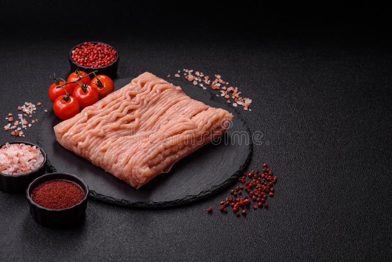 Raw Minced Chicken with Salt, Spices and Herbs Stock Photo - Image of ...