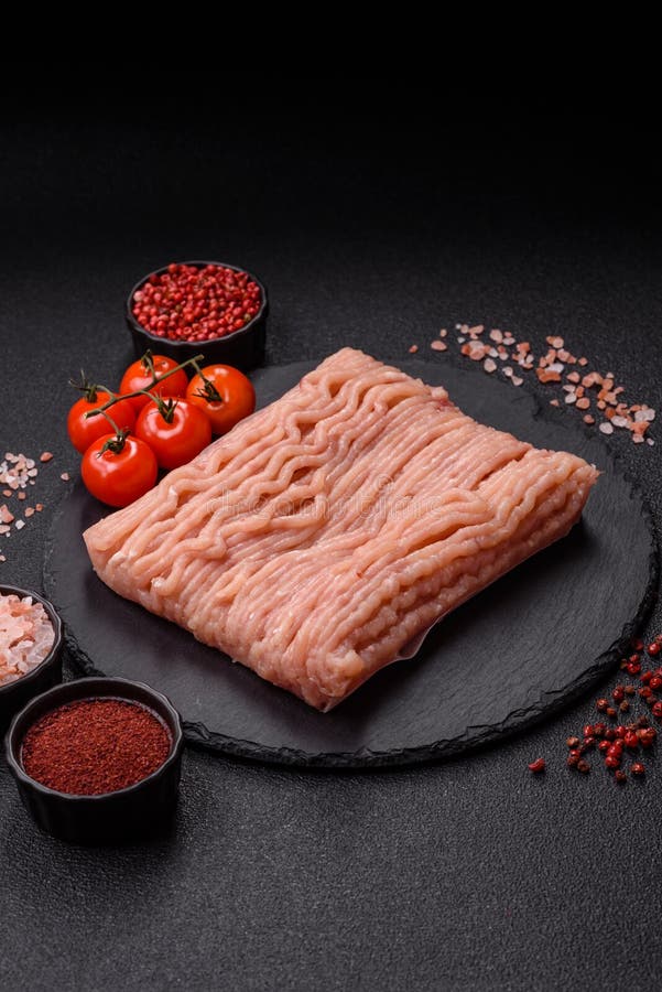 Raw Minced Chicken with Salt, Spices and Herbs Stock Photo - Image of ...