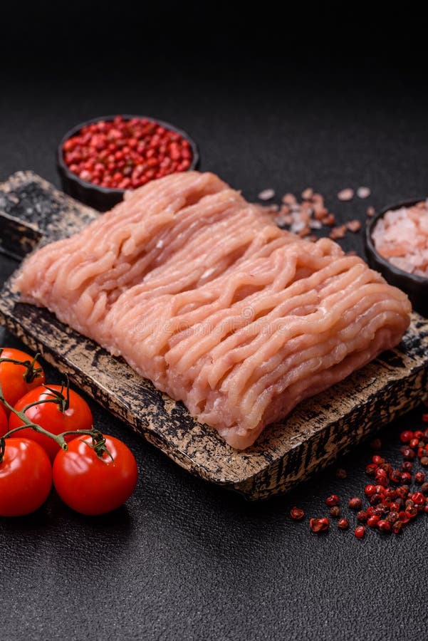 Raw Minced Chicken with Salt, Spices and Herbs Stock Photo - Image of ...