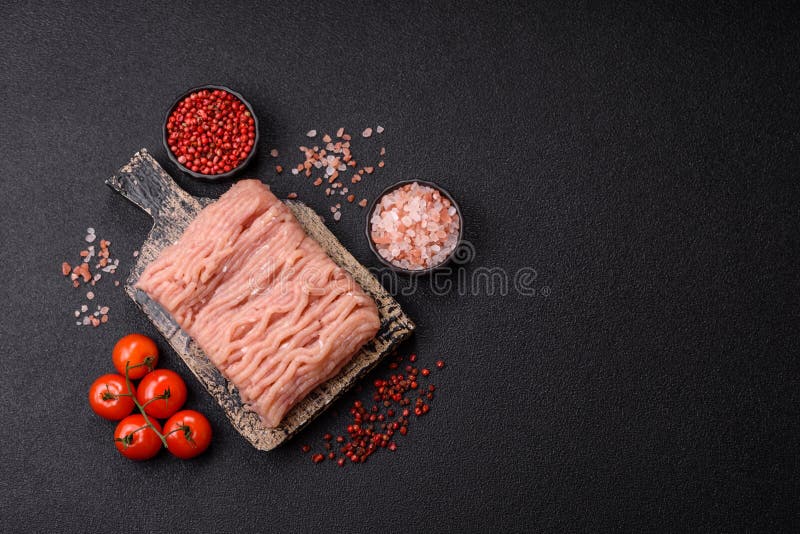 Raw Minced Chicken with Salt, Spices and Herbs Stock Photo - Image of ...
