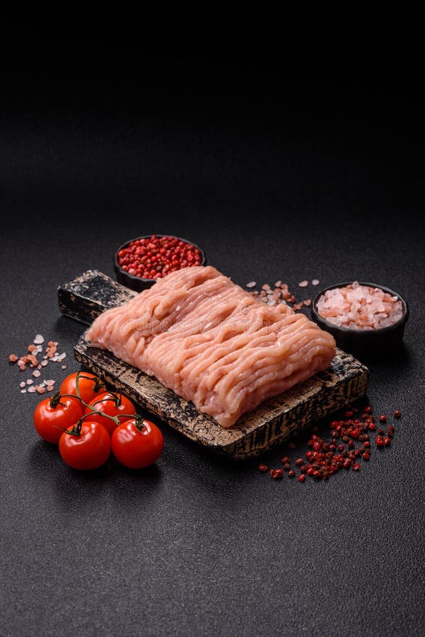 Raw Minced Chicken with Salt, Spices and Herbs Stock Photo - Image of ...