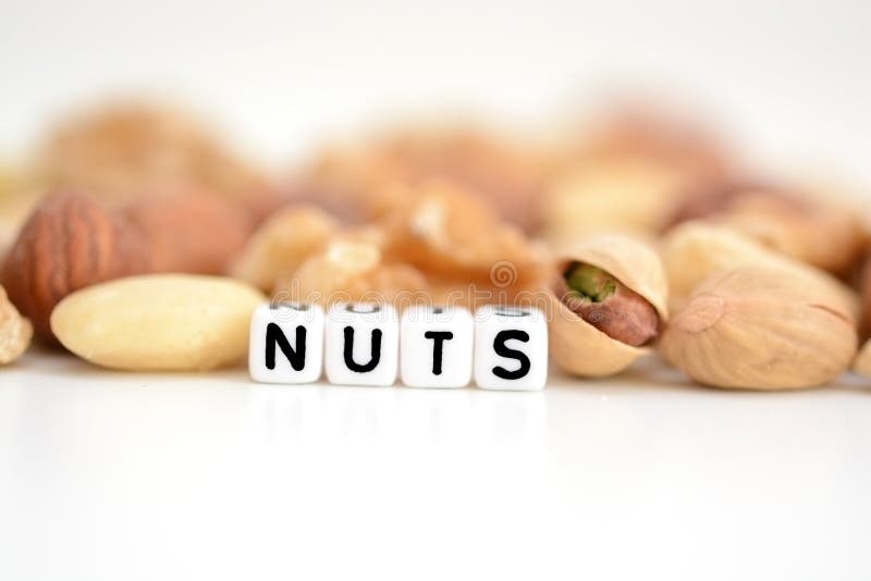 The Word Nuts on a Blue Background Stock Image - Image of minimal, pile ...