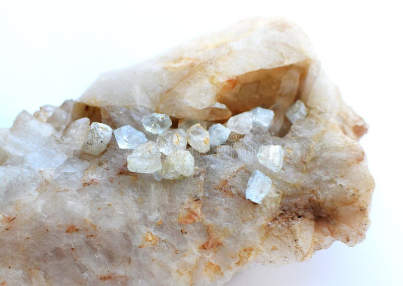 Raw Natural Topaz Crystals on Quartz Rock Stock Image - Image of ...