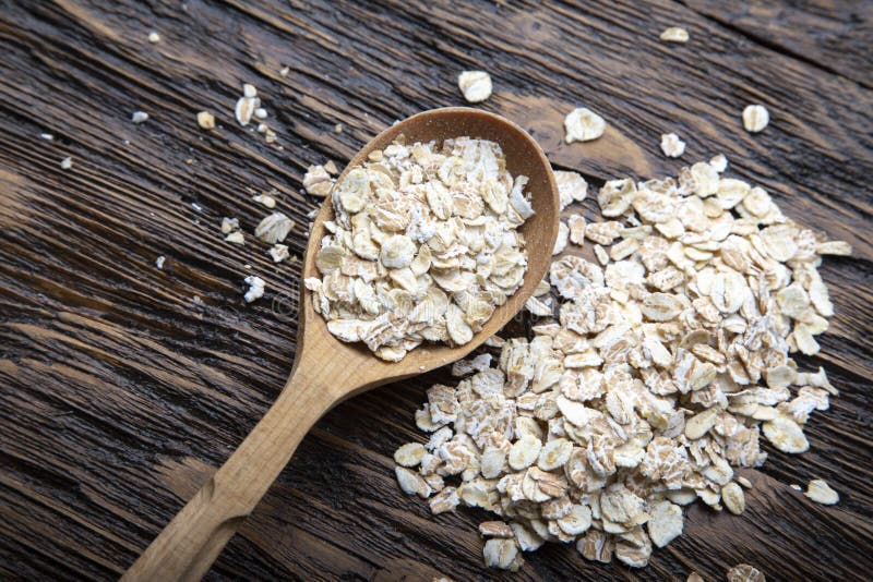 Raw oatmeal on the table stock photo. Image of natural - 173514320