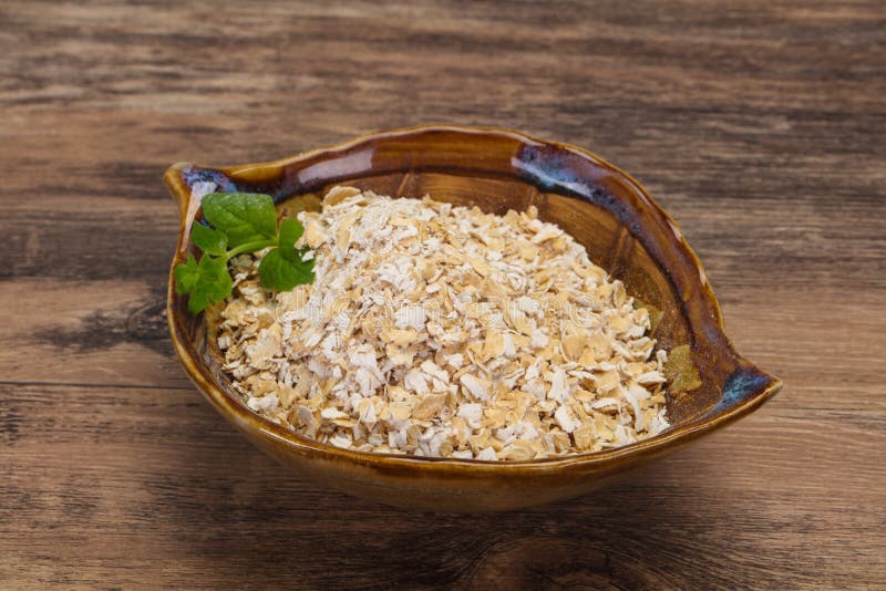Raw oats in the bowl stock image. Image of muesli, grain - 156513421