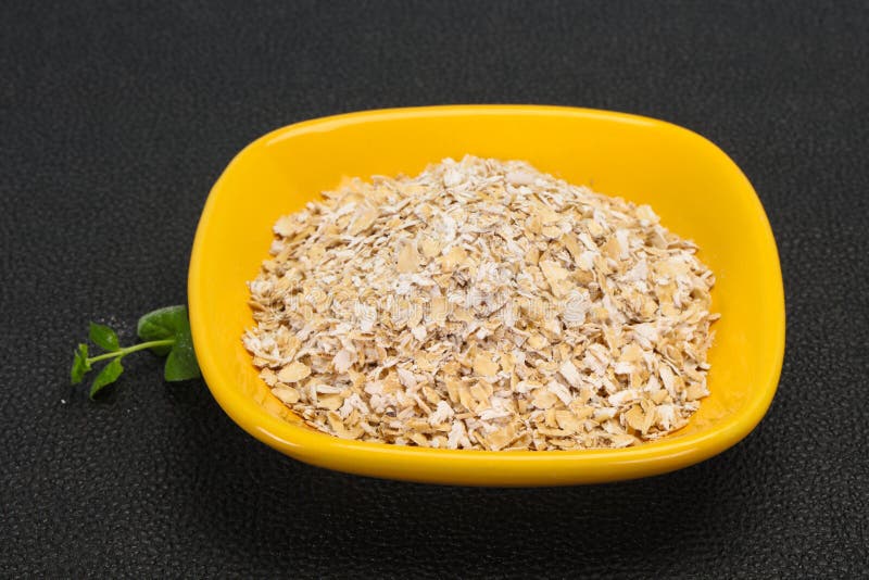 Raw oats in the bowl stock photo. Image of cereal, background - 157762148