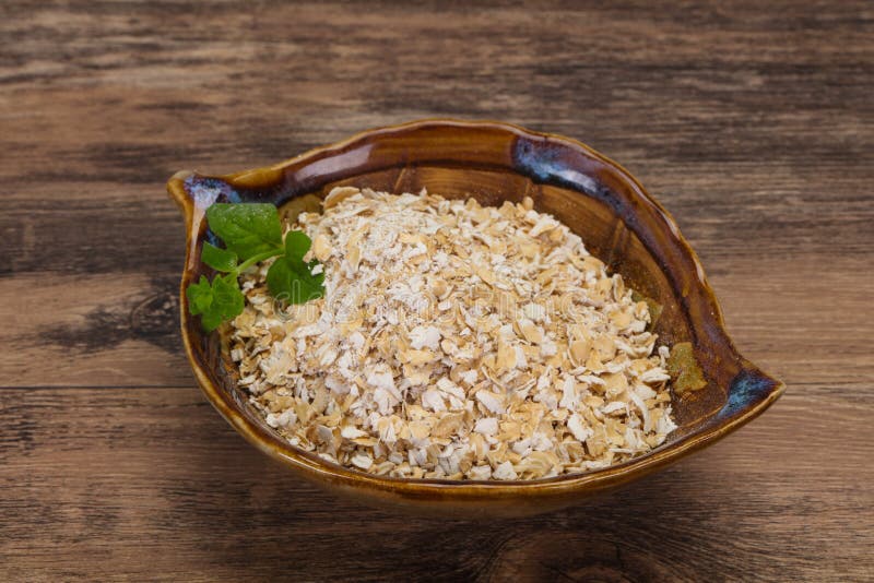 Raw oats in the bowl stock photo. Image of health, muesli - 179610626